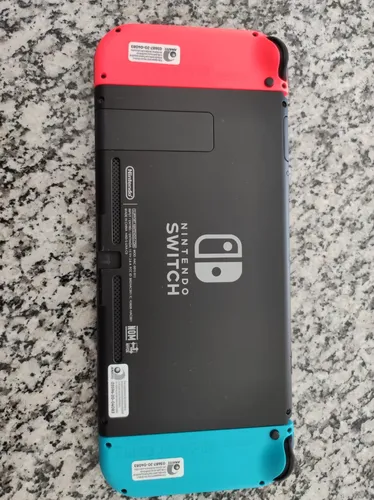 Nintendo Switch 32gb Standard V2 Cor Vermelho Néon Azul Néon Pouco