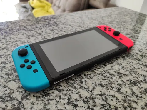 Nintendo Switch 32gb Standard V2 Cor Vermelho Néon Azul Néon Pouco