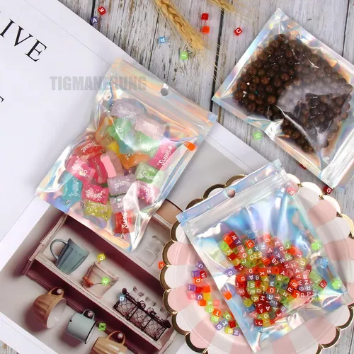 Aa Tigmanerung 50pcs Plastic Boutique Bags Tornasol Fs | Parcelamento ...
